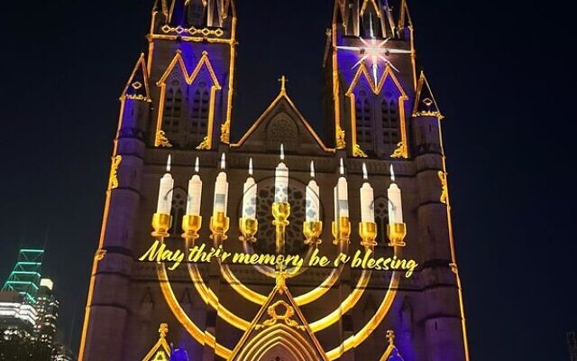 Menorah image beamed onto cathedral in solidarity – The Australian ...
