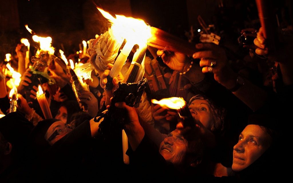 Christian pilgrims hold ancient 'holy fire' ceremony in Old City | The ...