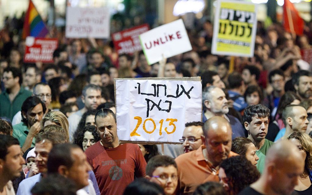 Thousands take to the streets to protest tax hikes | The Times of Israel