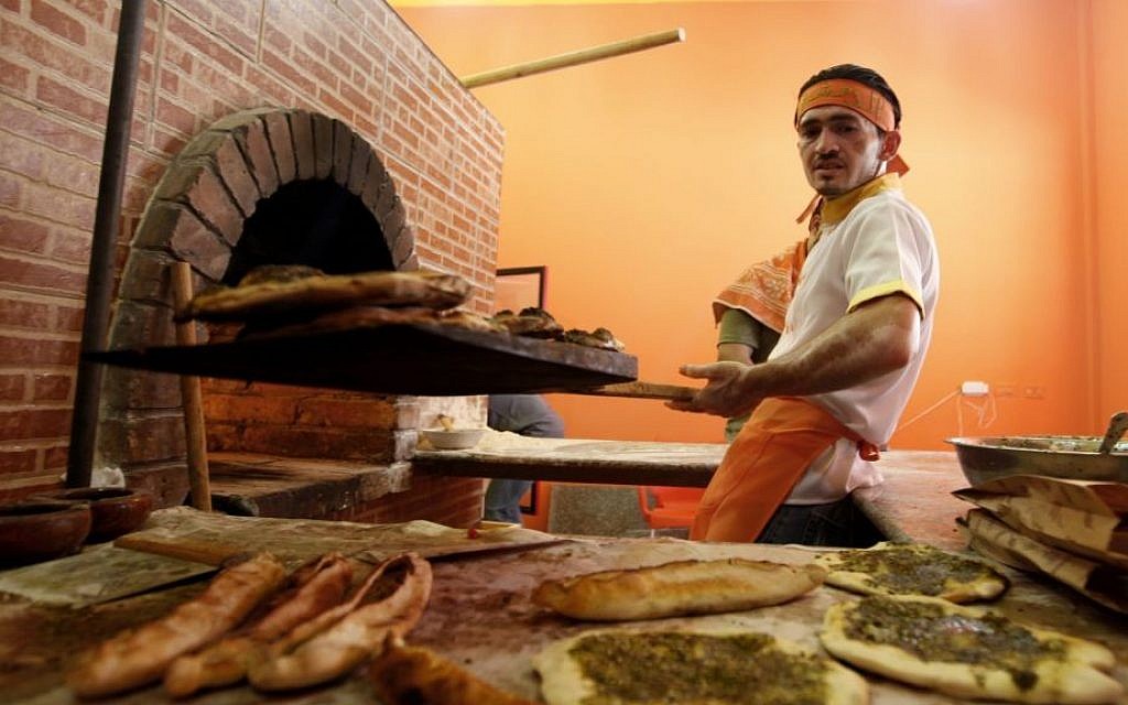 Gaza suffers drop in foreign aid over Syrian war | The Times of Israel