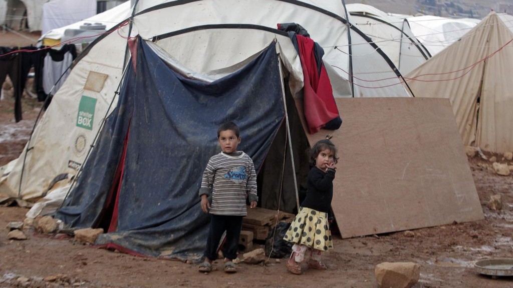Syrian refugees' debt out of control, aid group warns | The Times of Israel