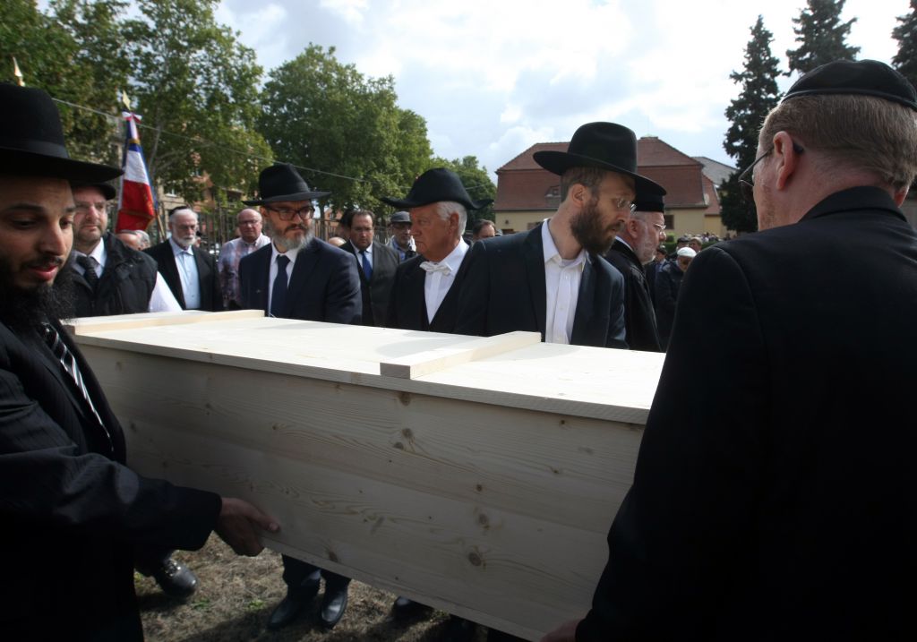 France buries Holocaust victims' secretly preserved remains | The Times ...