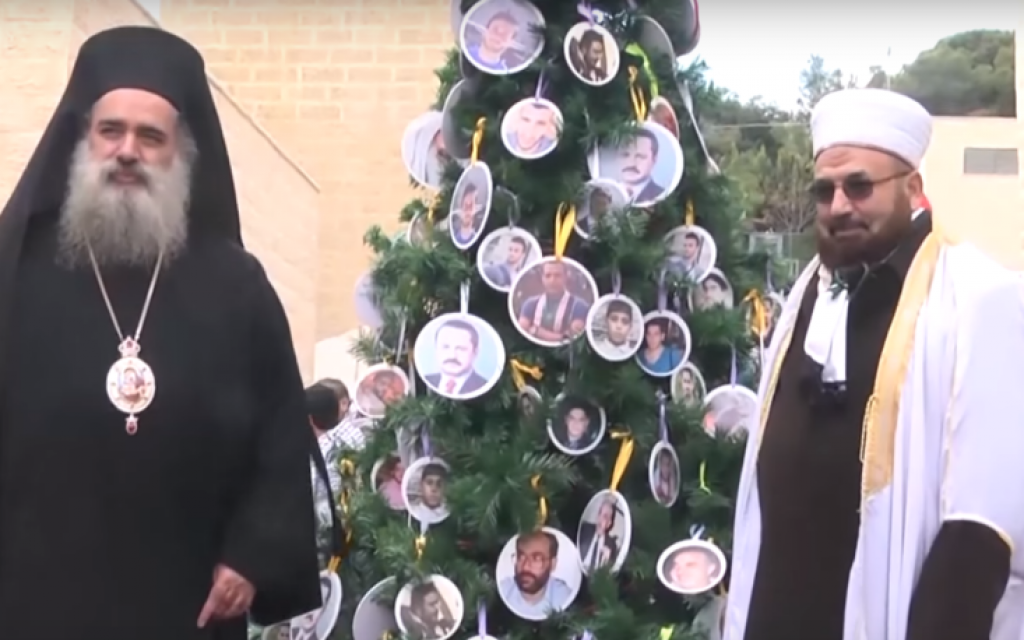 Al-Quds University puts up martyr-themed Christmas tree | The Times of ...