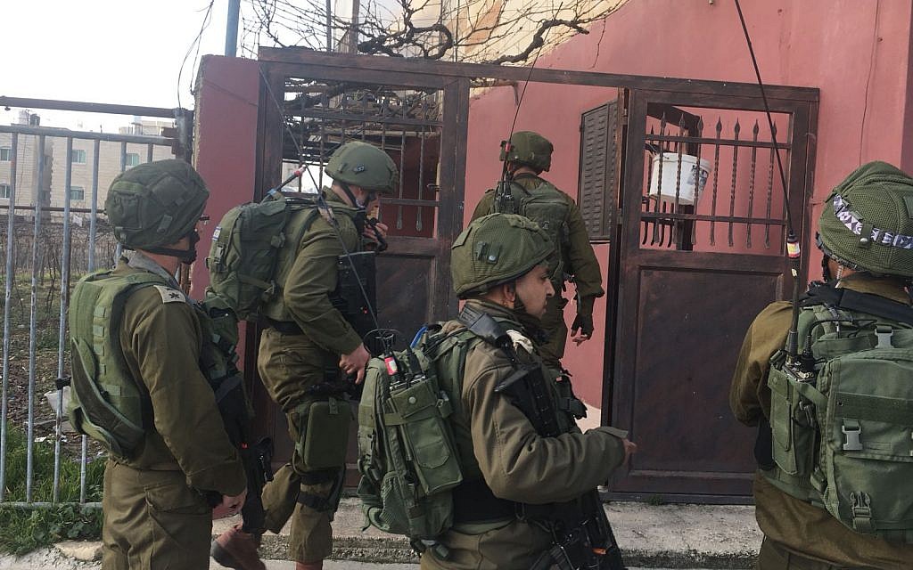 Israeli troops raid home of terrorist who stabbed security guard | The ...