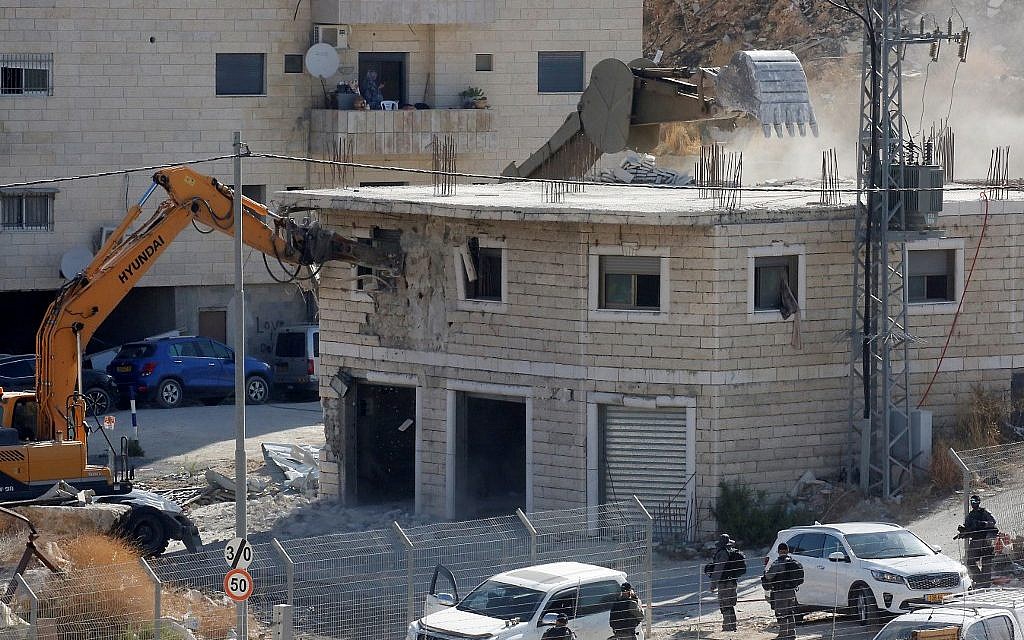 Palestinians blast 'massacre' as Israel razes homes near security ...