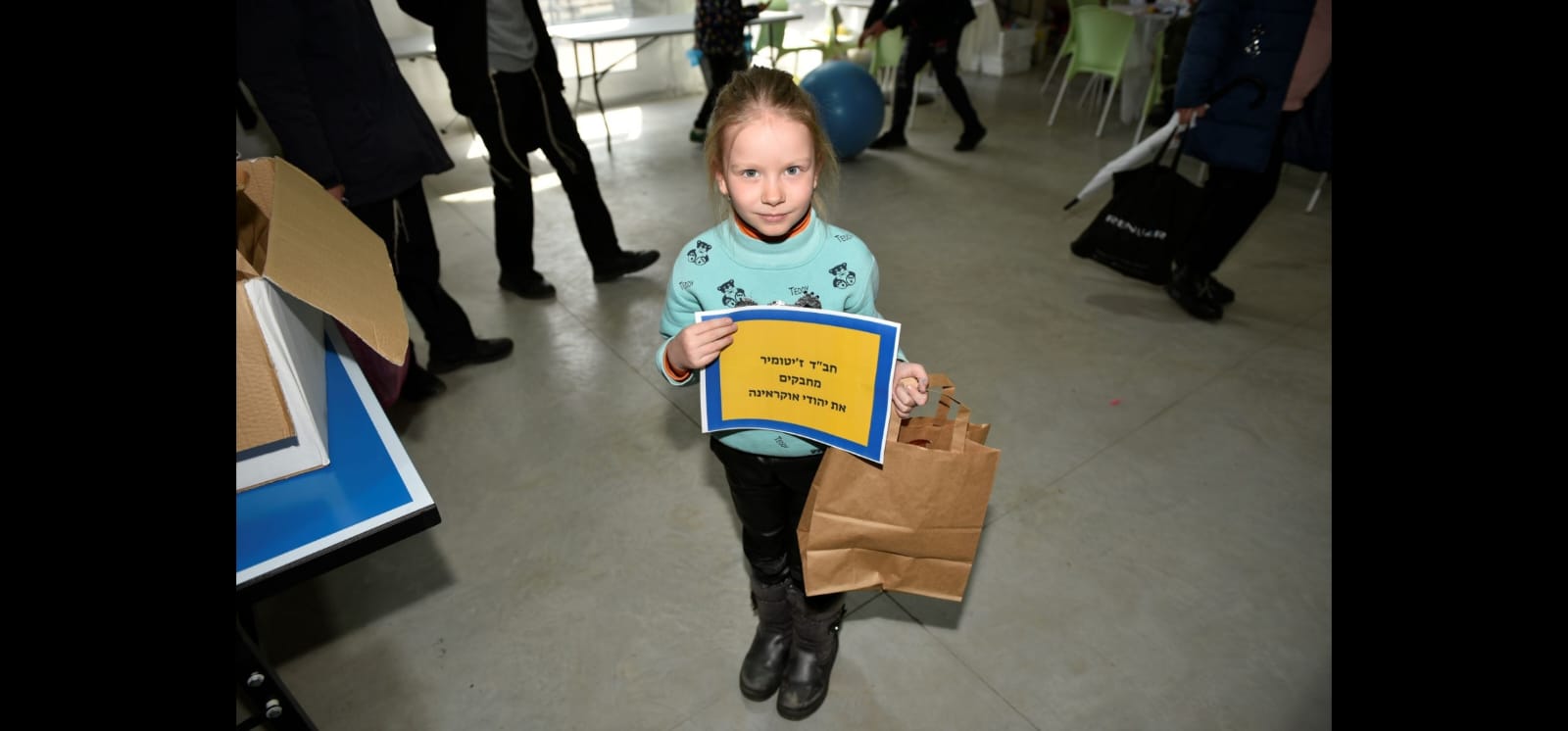 Children brought from Ukraine to Israel make Purim packages for those ...