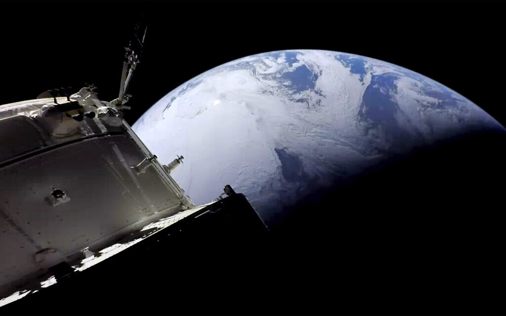NASA's Orion capsule blazes home from test flight to moon, lands in ...