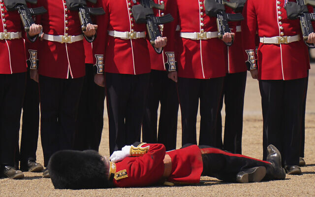 Several British royal guards faint due to heat during ceremony with ...