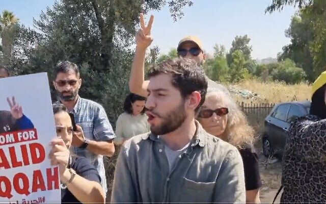Left-wing activist in custody over hat showing Palestinian rock thrower ...
