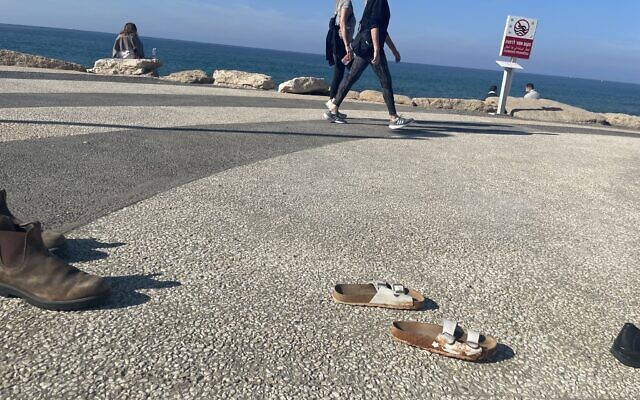 Hostages' sister creates trail of shoes on Tel Aviv boardwalk | The ...