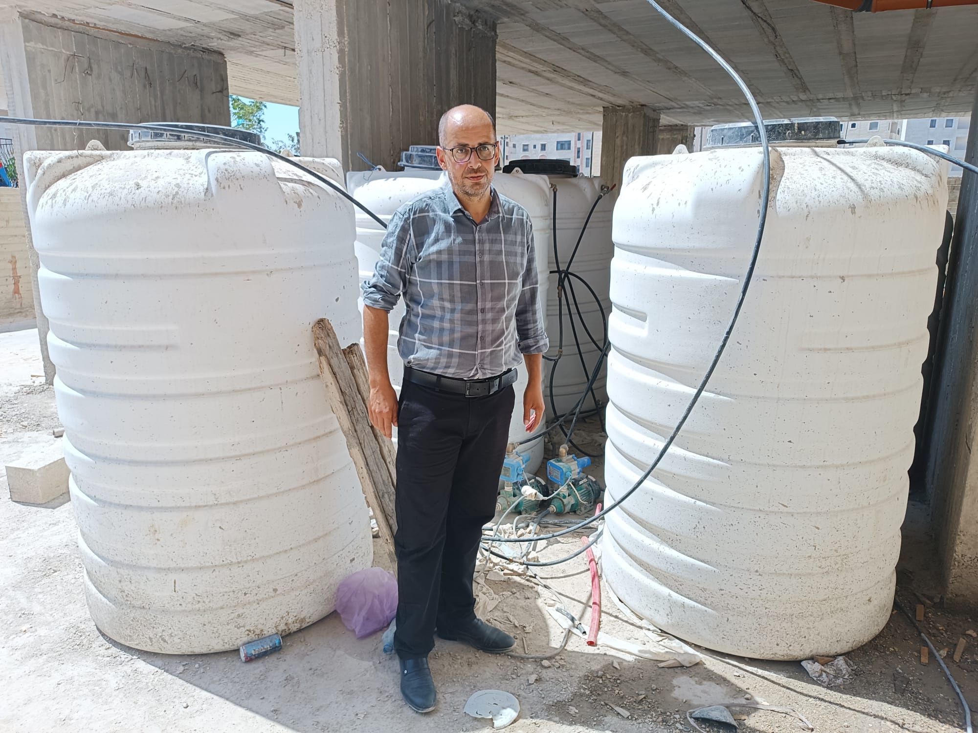 In summer heat, East Jerusalem suburb receives water for only 12 hours ...